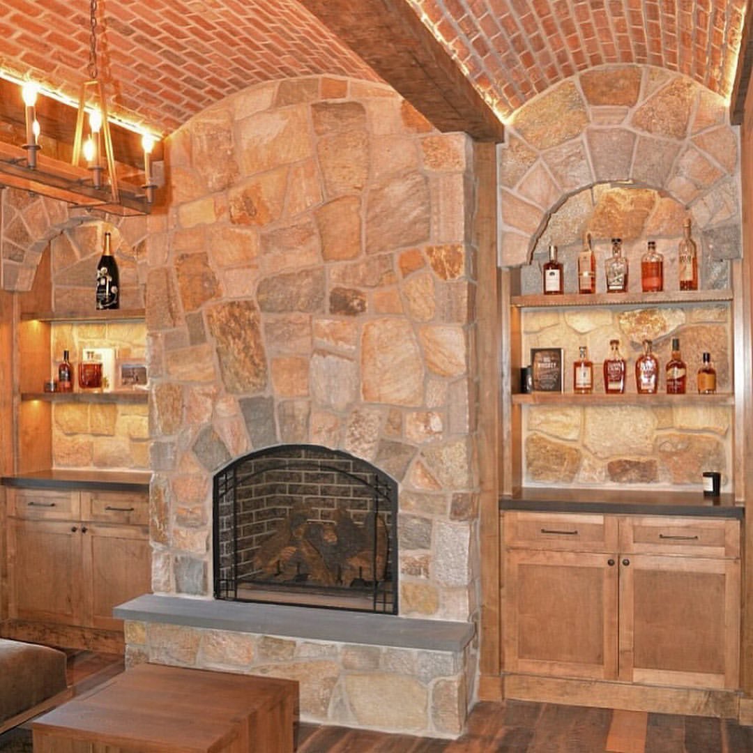 3 Unique Interior Fireplaces Featuring Natural Stone Veneer