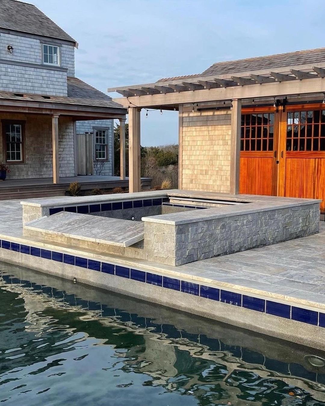 Stone Trend of the Summer: Spillover Spas and Stunning Pools