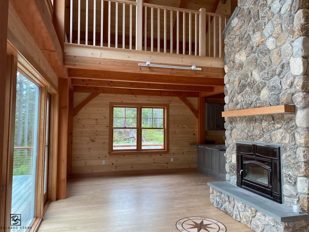 4 Stone Fireplaces That Shine Alongside Wood