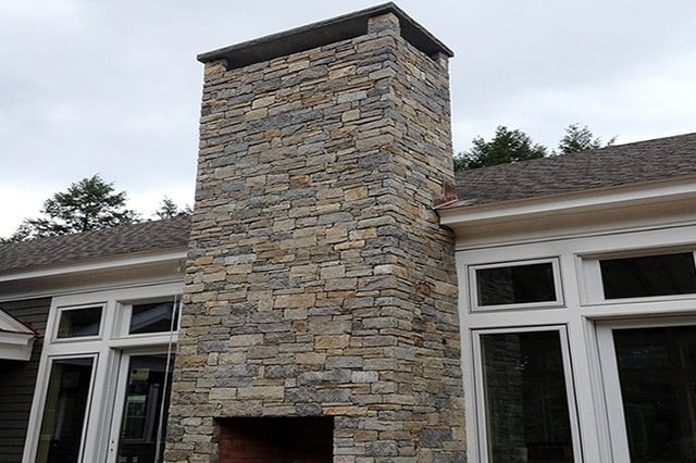 Natural Veneer Stone Fireplace & Chimney - Delgado Stone