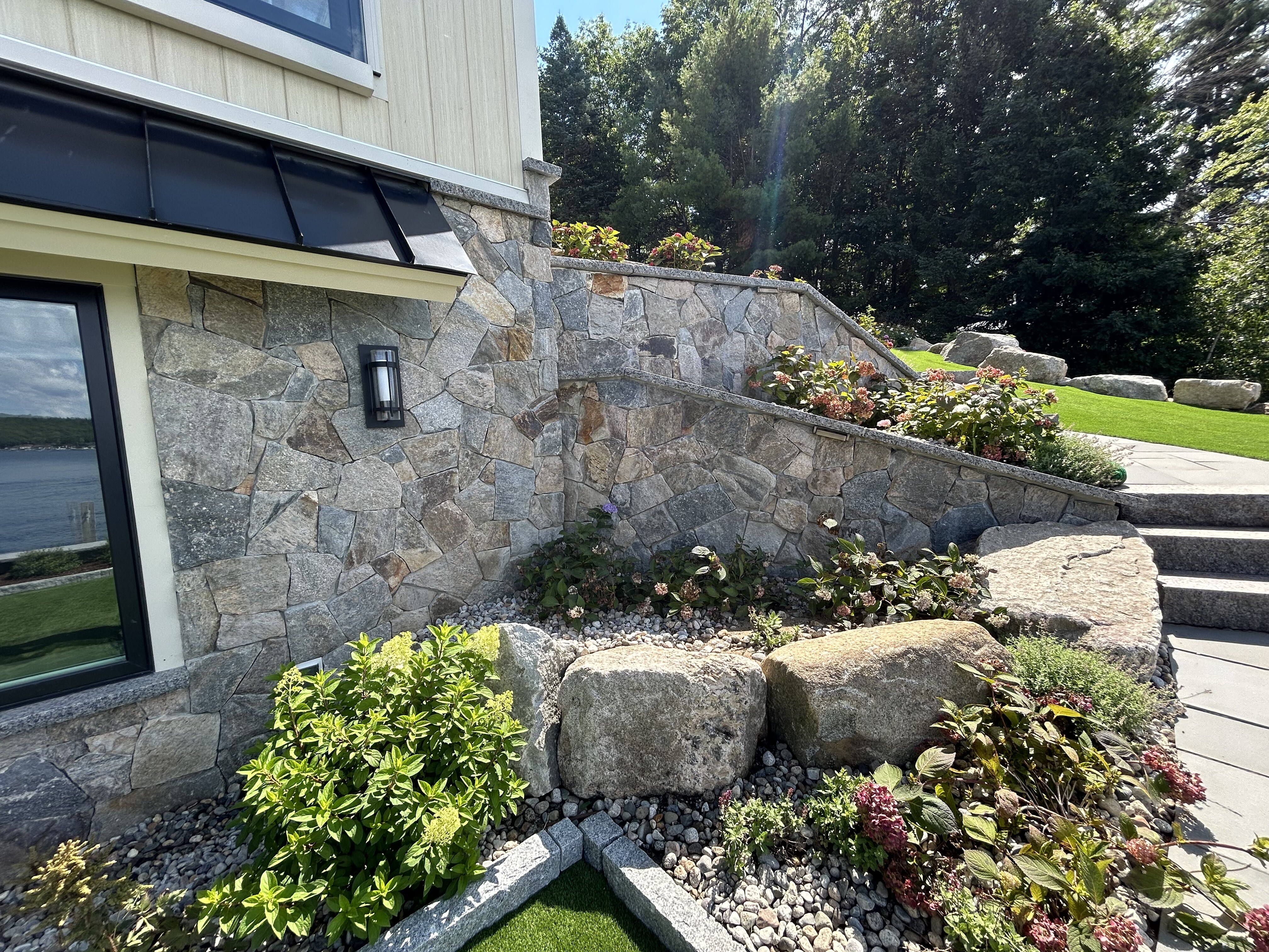 4 Standout Natural Stone Wall Designs to Consider This Spring!